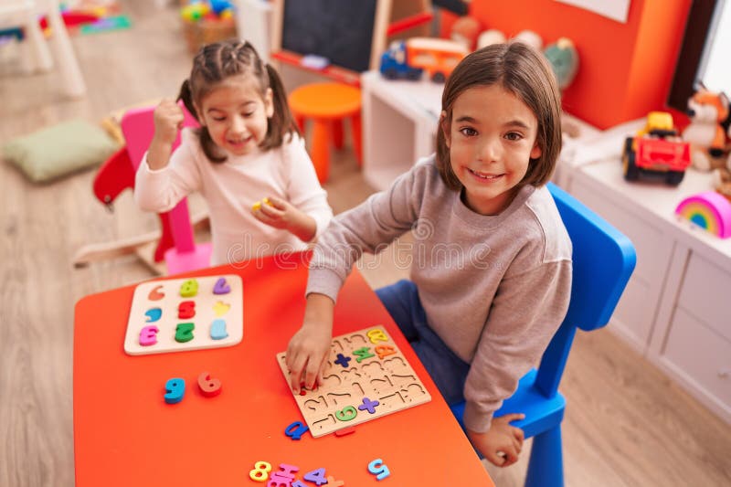 Adorable Boy and Girl Playing with Maths Puzzle Game Sitting on Table ...
