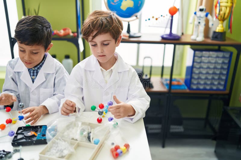 Adorable Boys Students Playing with Molecules Toy at Laboratory ...