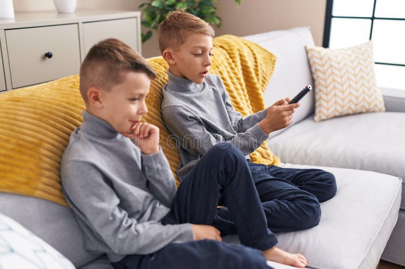Adorable Boys Watching Tv Sitting on Sofa at Home Stock Image - Image of childhood, together ...