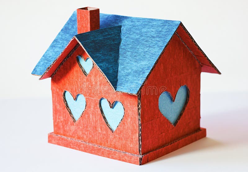 Adorable Cardboard House Model with Heart Windows High Quality Image ...