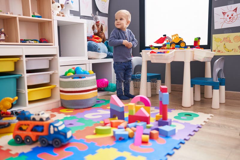 Adorable Caucasian Boy Playing with Construction Blocks Standing at ...