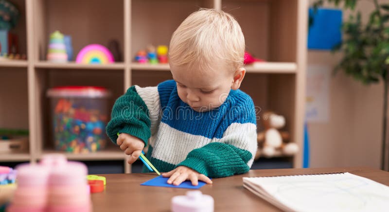 Adorable Caucasian Boy Student Cutting Paper at Kindergarten Stock ...