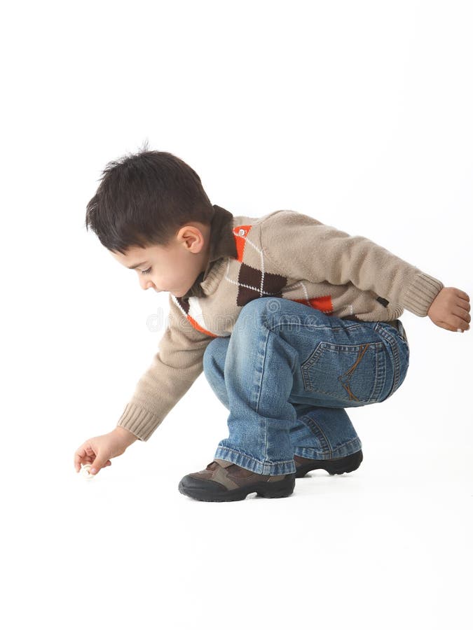 Adorable Child in Studio Crouching Stock Image - Image of crouching ...