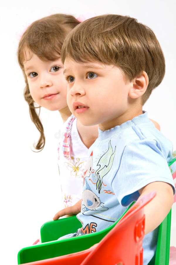 Adorable Children Sitting on Colorful Chairs Stock Photo - Image of ...