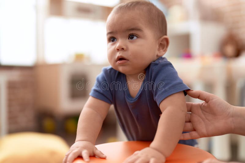 Adorable Chinese Toddler Leaning on Stool Standing at Kindergarten ...