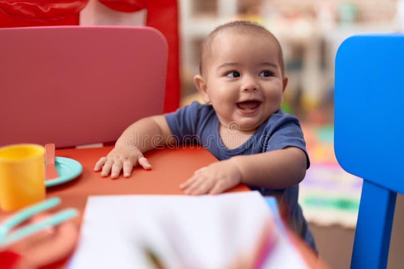 Adorable Chinese Girl Sitting Table Crying at Kindergarten Stock Photo ...