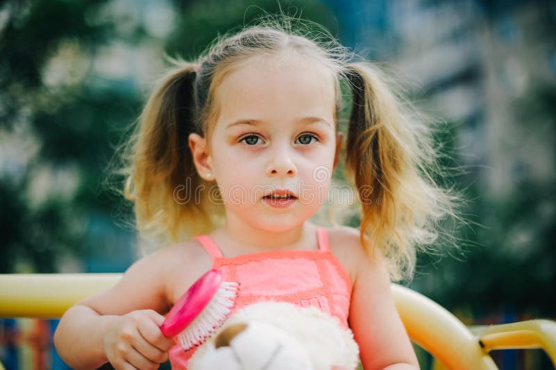 Adorable Girl In Dress Swing On Playground In Park Beautiful Little