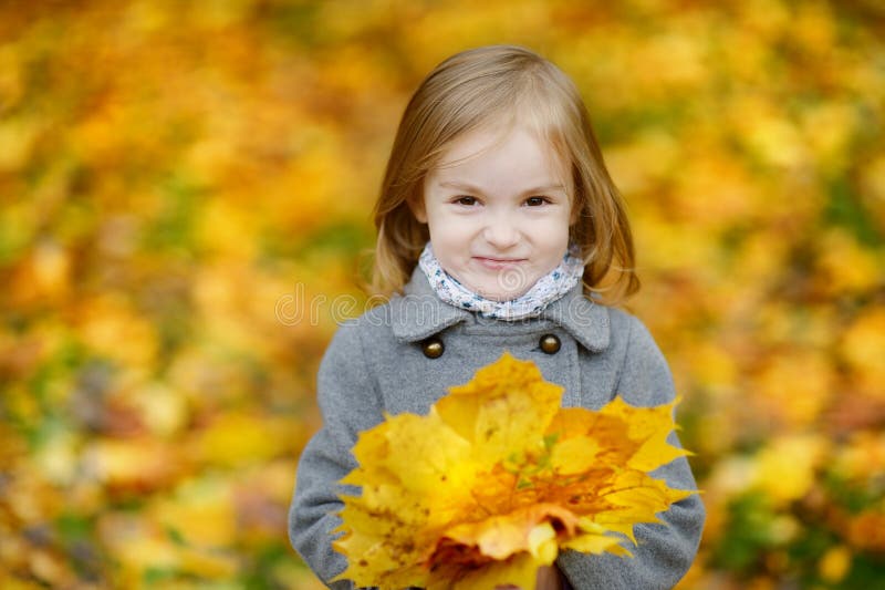 Adorable Girl Having Fun on Autumn Day Stock Photo - Image of alley ...