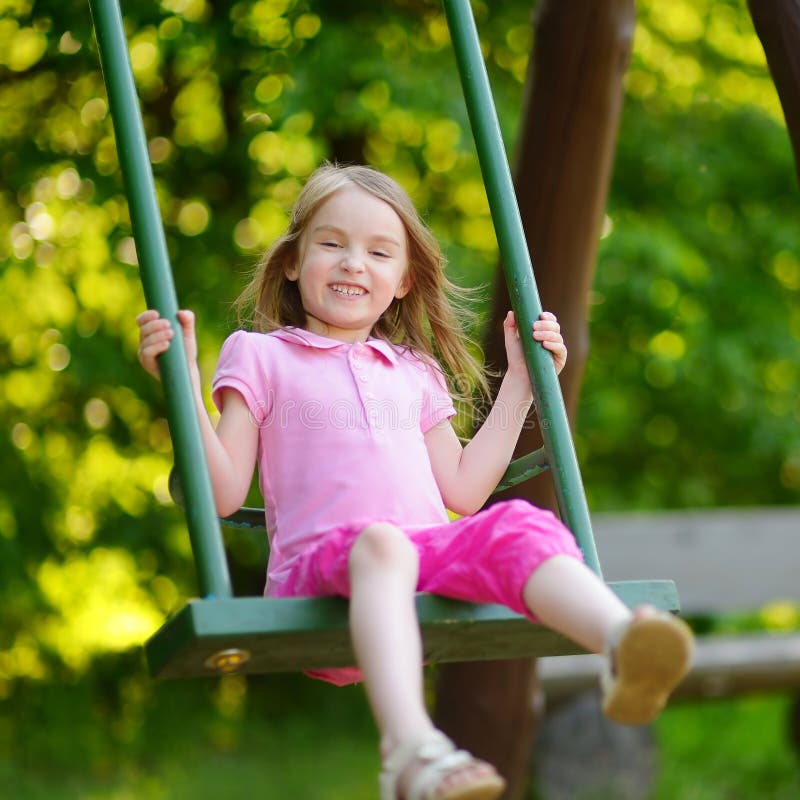 Adorable Girl Having Fun on a Swing Stock Image - Image of active ...