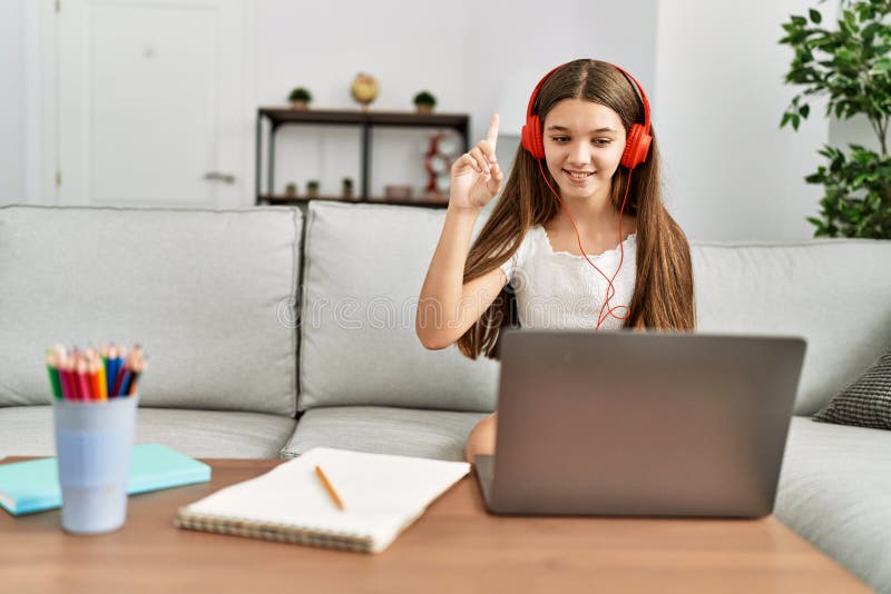 Adorable Girl Having Online Class Sitting on Sofa at Home Stock Image ...