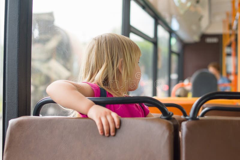Adorable girl ride bus stock image. Image of healthy - 25668435