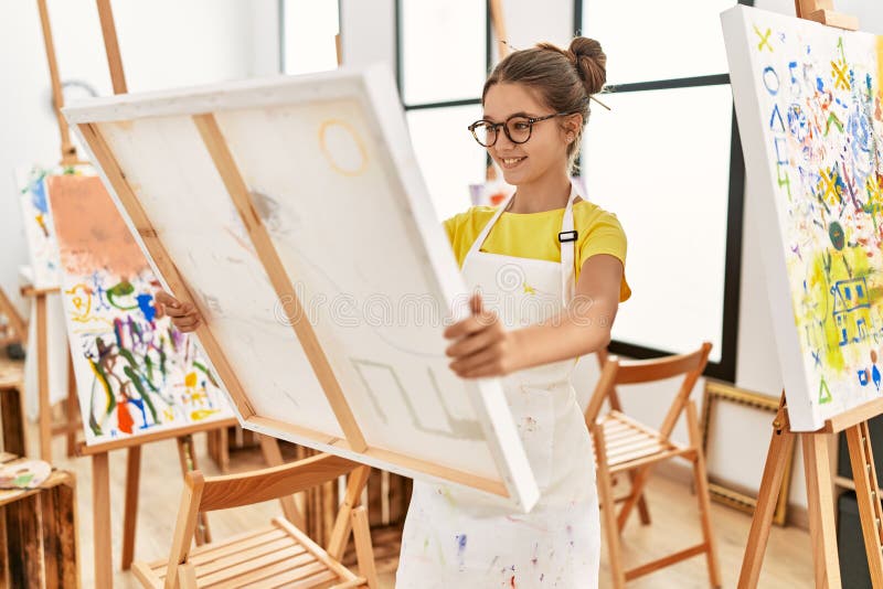 Adorable Girl Smiling Confident Looking Canvas Draw at Art Studio Stock ...