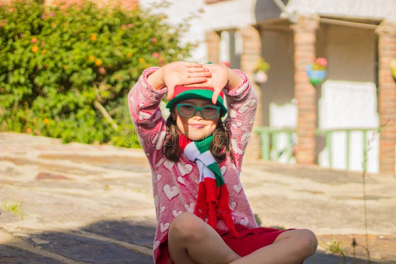 Adorable Girl Smiling and Looking at the Camera Stock Photo - Image of ...