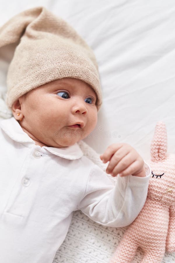 Adorable Hispanic Baby Lying on Bed at Bedroom Stock Image - Image of ...