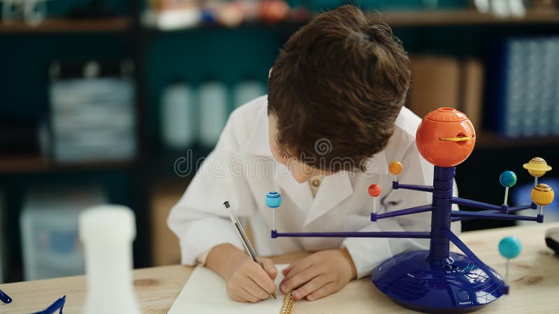 Adorable Hispanic Boy Astronomer Student Make Planetary Work Writing on ...