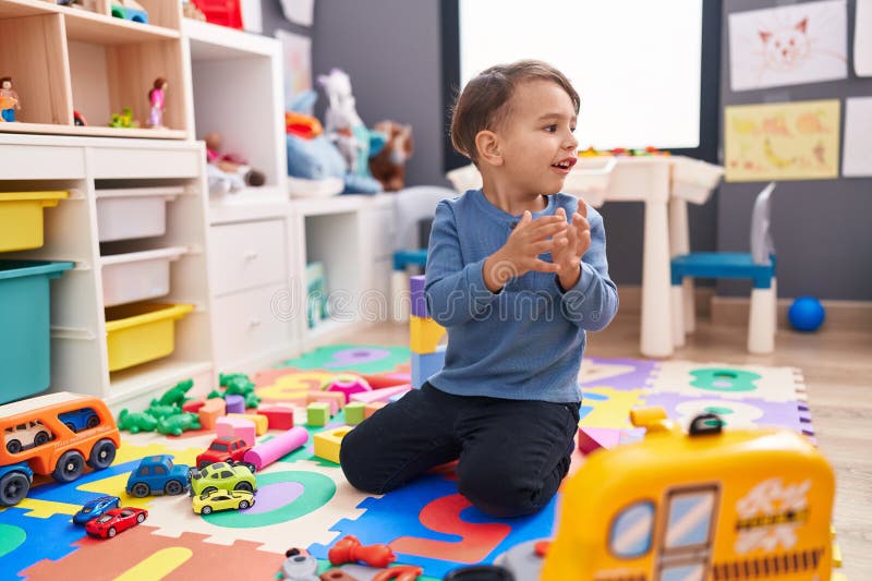 Adorable Hispanic Boy Smiling Confident Clapping Hands at Kindergarten ...