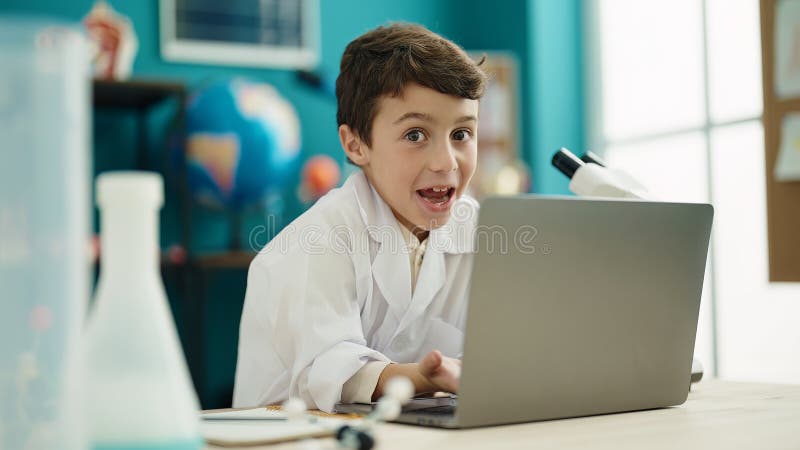 Adorable Hispanic Boy Student Having Video Call at Laboratory Classroom ...