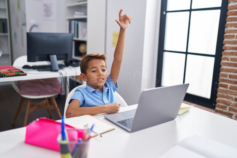 Adorable Hispanic Boy Student Using Computer Having Long Distance ...