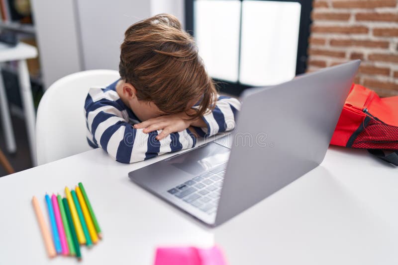 Adorable Hispanic Boy Student Using Computer with Stressed Expression ...