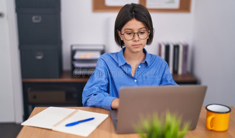 Adorable Hispanic Girl Business Worker Using Laptop Working at Office ...