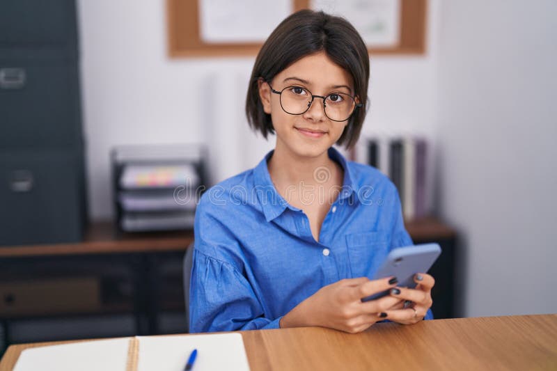 Adorable Hispanic Girl Business Worker Using Smartphone Working at ...