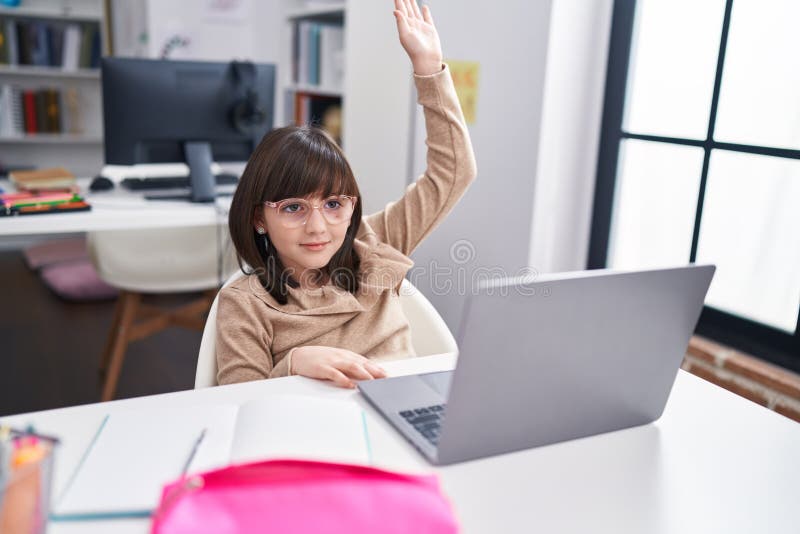 Adorable Hispanic Girl Student Having Lesson with Hand Raised Up at ...