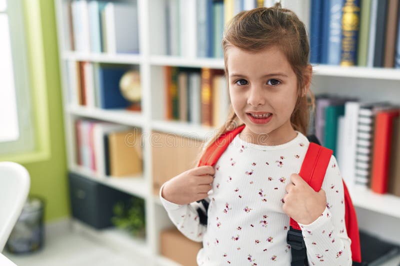 Adorable Hispanic Girl Student Smiling Confident Standing at Classroom ...