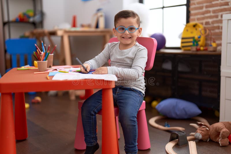 Adorable Hispanic Toddler Student Smiling Confident Drawing on Notebook ...