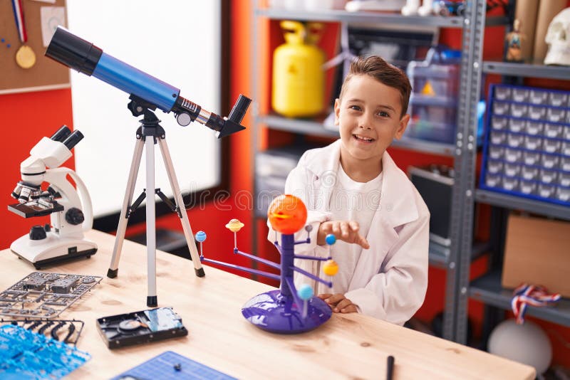 Adorable Hispanic Toddler Student Smiling Confident Using Telescope at ...