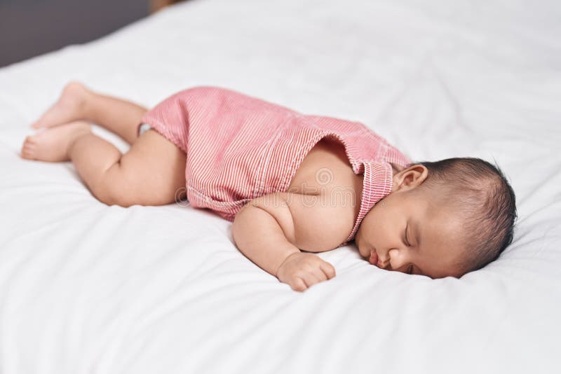 Adorable Infant Lying on Bed Sleeping at Bedroom Stock Photo - Image of ...