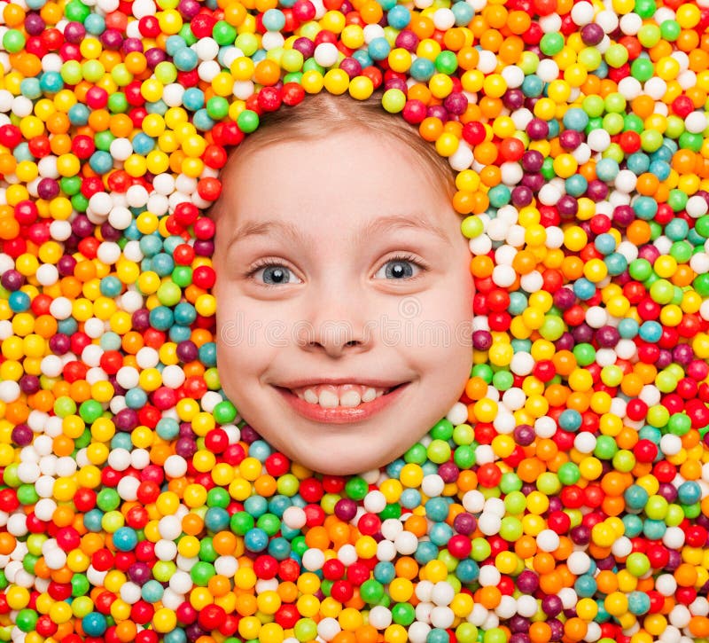 Adorable Kid Posing on Candies Stock Image - Image of grimace ...