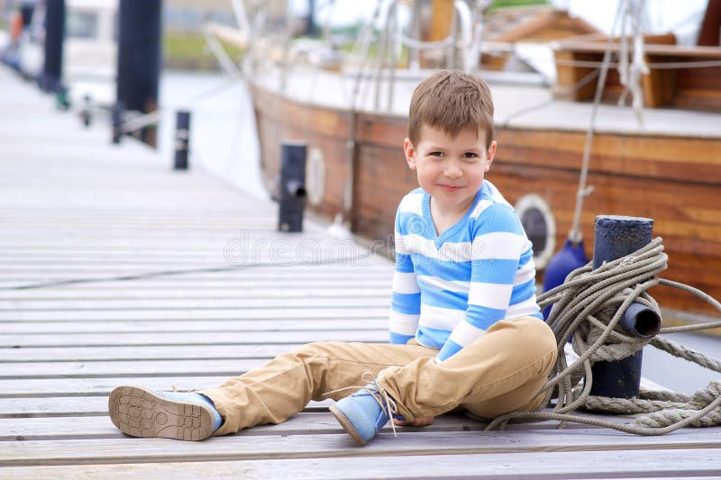 Adorable kid stock image. Image of striped, outside, small - 54857871