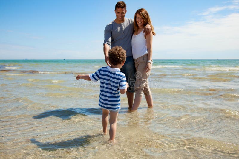 Adorable Kid Walk Towards His Parents Stock Image - Image of holiday ...
