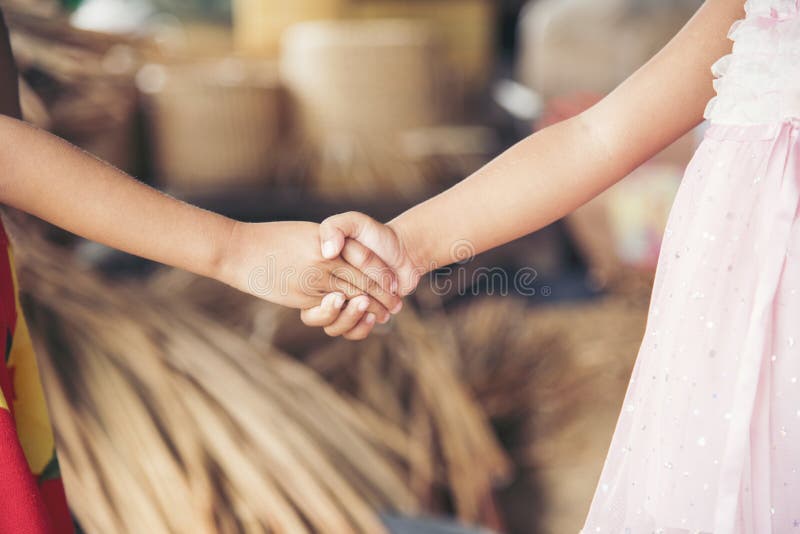 193 Kids Shaking Hands Stock Photos - Free & Royalty-Free Stock Photos ...