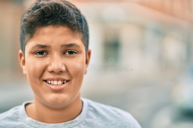 Adorable Latin Boy Smiling Happy Standing at the City Stock Photo ...