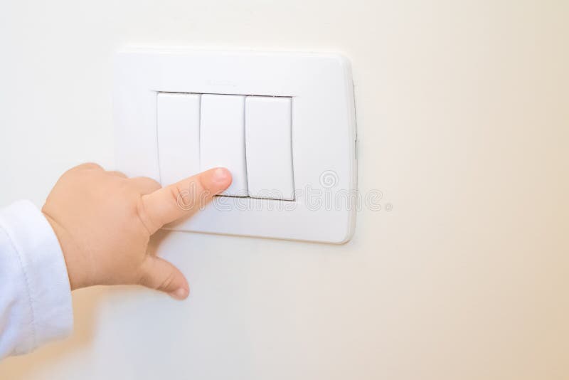 Adorable Little Boy Child Turning on the White Light-switch Stock Image ...