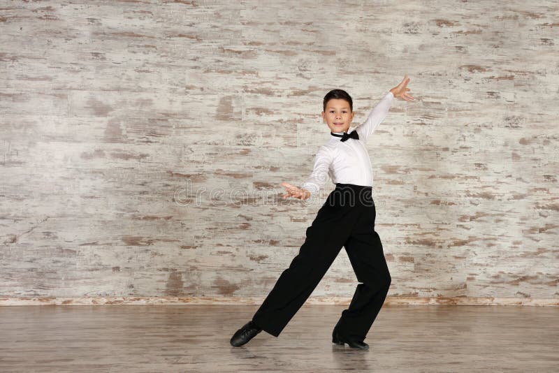 Adorable Little Boy Dancing in Studio, Space for Text Stock Photo ...