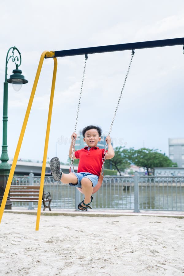 Adorable Little Boy Having Fun on a Swing Outdoor Stock Photo - Image ...