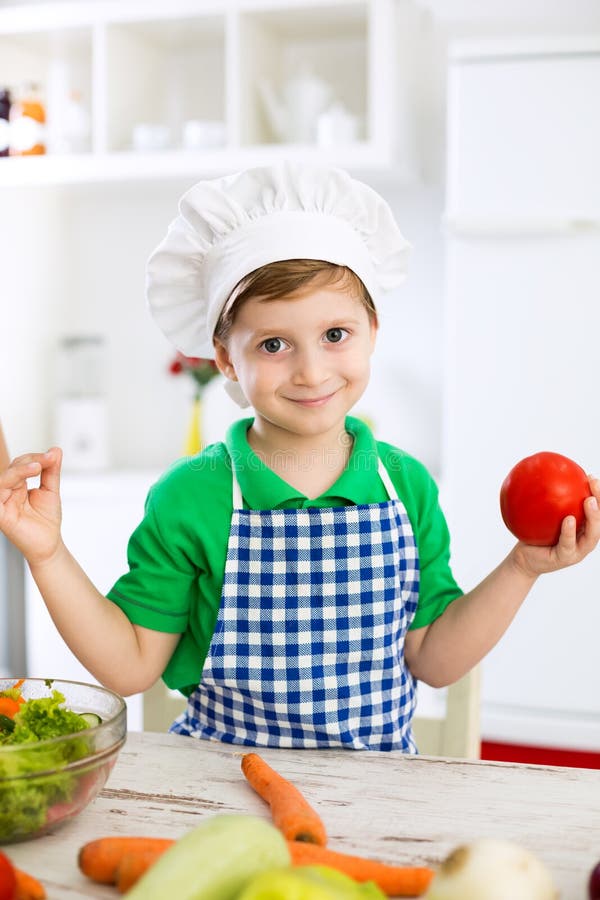 Adorable little child chef stock image. Image of cheerful - 61568955