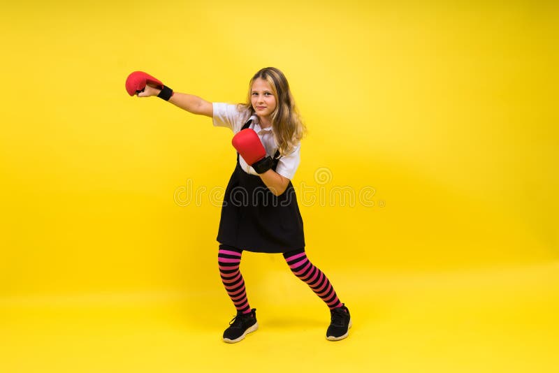 Adorable Little Girl Boxer Practicing Punches in Studio Stock Photo ...