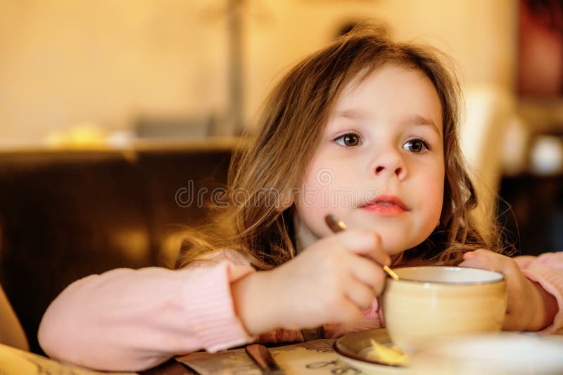 Adorable Little Girl at Cafe Stock Image - Image of cheek, childhood ...