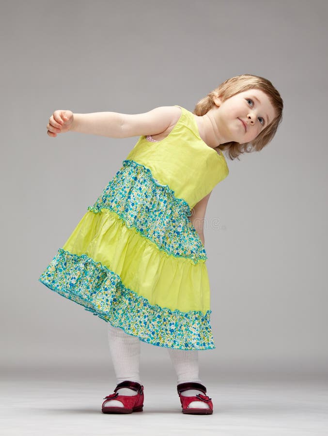Little Girl Dancing Neutral Background Stock Photos - Free & Royalty ...