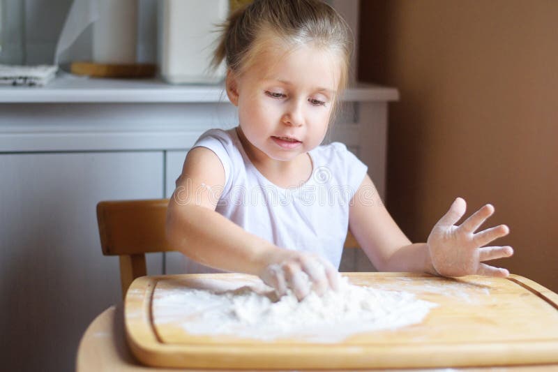 Adorable Little Girl Making the Dough for Pasta Stock Photo - Image of ...