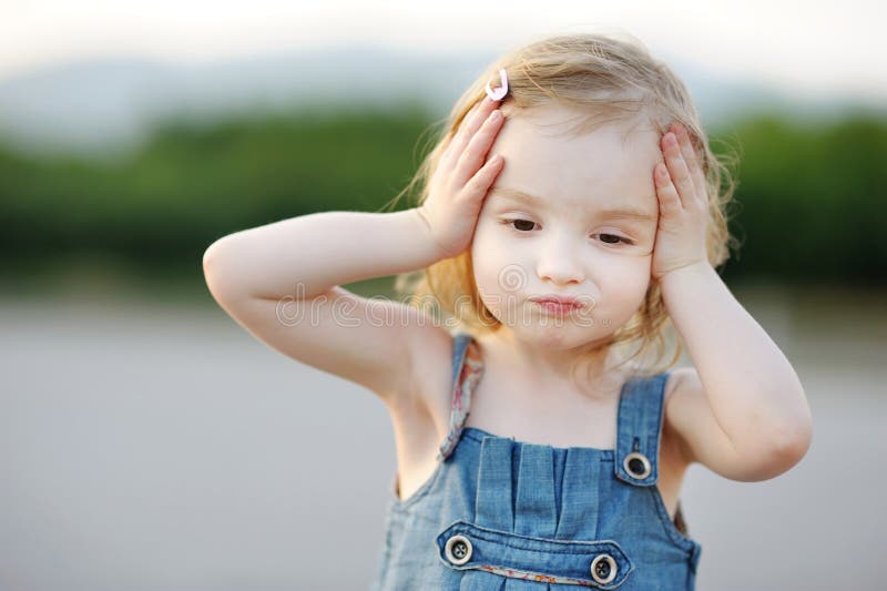 Adorable Little Girl Making Funny Face Stock Photo - Image of hair ...