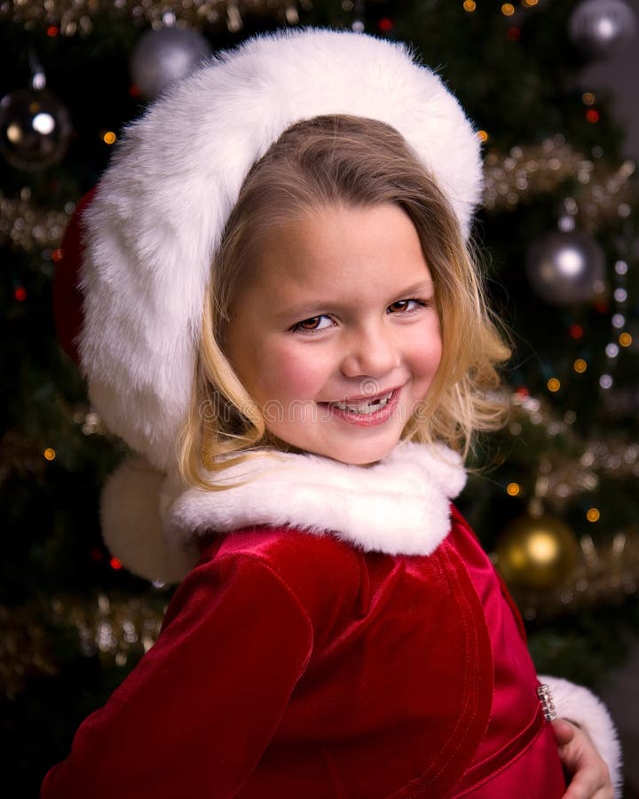 Adorable Little Girl in a Santa Hat Stock Image - Image of curls, santa ...