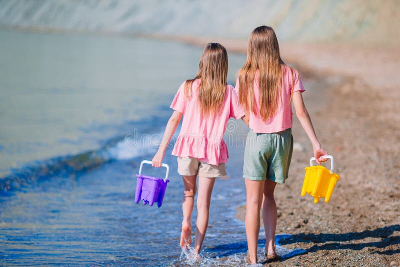 Adorable Little Girls Having Fun on the Beach Stock Image - Image of ... Adorable Little Girls Having Fun on the Beach Stock Image - Image of ...