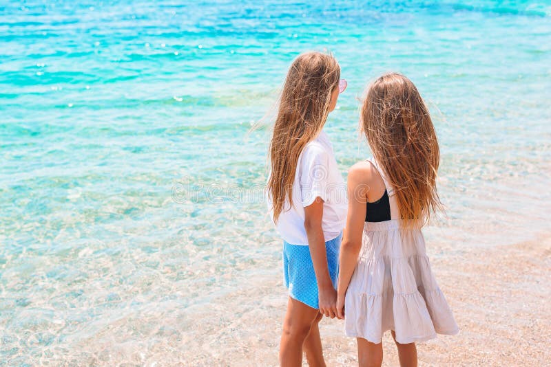 Adorable Little Girls Having Fun on the Beach Stock Photo - Image of ...