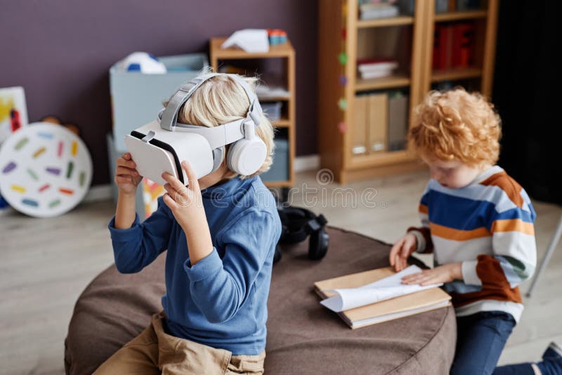 Adorable Little Learner in Vr Headset Playing Virtual Game Stock Image ...