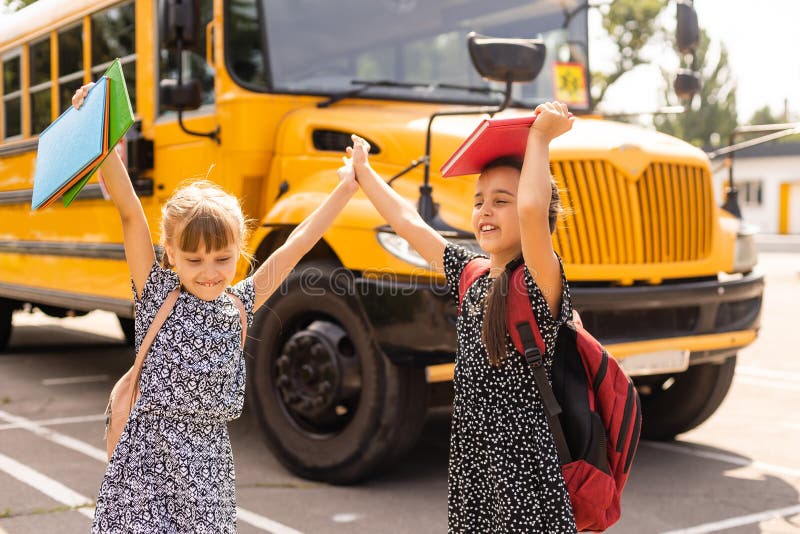 Adorable Schoolchildren Running To School Bus Stock Photo - Image of ...