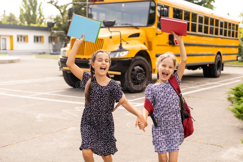 Adorable Schoolchildren Running To School Bus Stock Image - Image of ...
